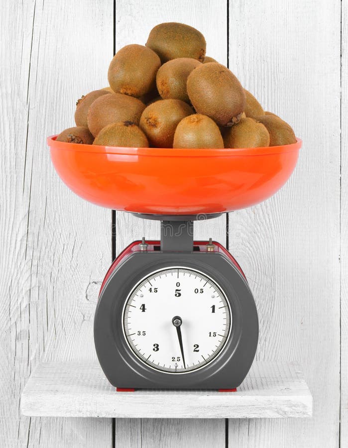 Kiwi on scales stock image. Image of nutrition, sliced - 44809045