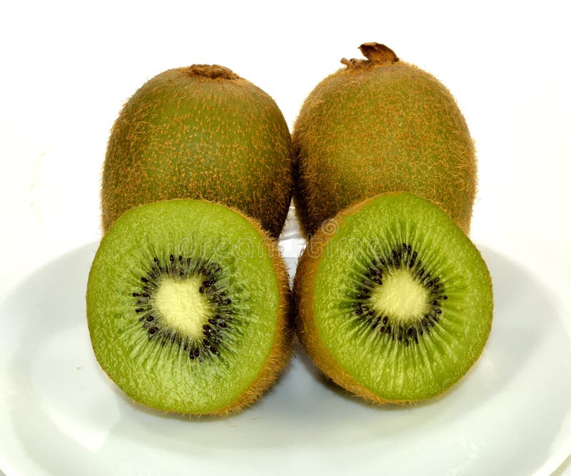 Kiwi and slices stock photo. Image of kiwi, plate, tasty - 31860070