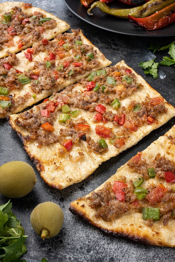Kiymali Pide Turkish Pide with Minced Meat, on Black Dark Stone Table ...