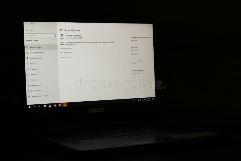 The Laptop with Windows Update on Screen. Its Offers Increased Security ...