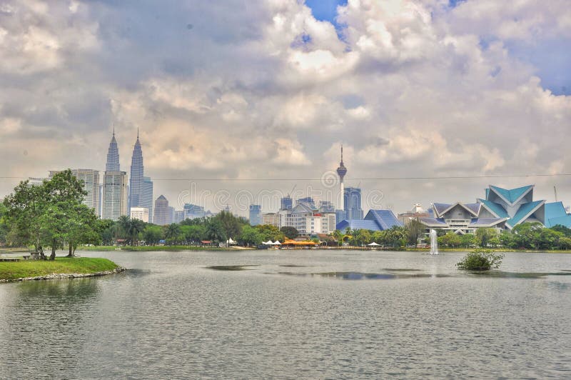 KLCC, KL Tower, Lake, Tree editorial stock photo. Image of vehicle ...