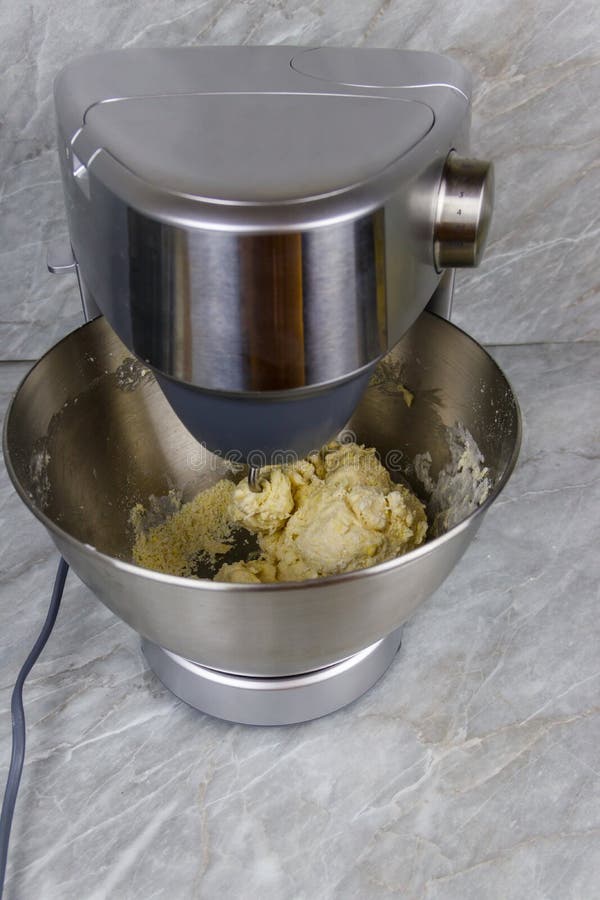 Kneading Dough in the Modern Kitchen Machine on Table Stock Photo ...