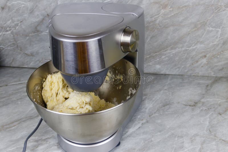 Kneading Dough in the Modern Kitchen Machine on Table Stock Photo ...