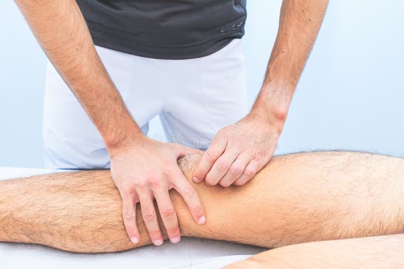 Knee Patella Mobilization by a Physical Therapist Stock Image - Image ...