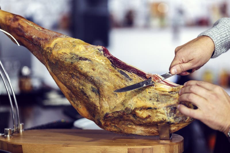 A knife cut ham stock photo. Image of products, hands - 78932546