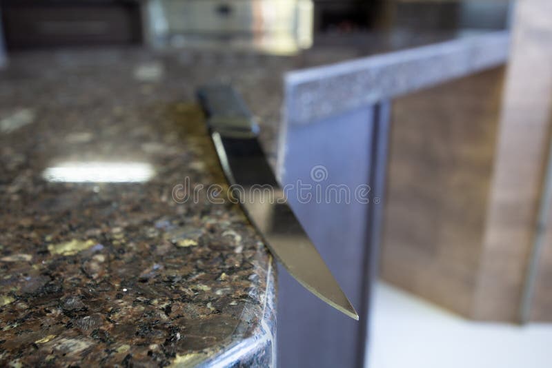 Knife at the End of the Worktop with Risk of Falling. Stock Photo ...