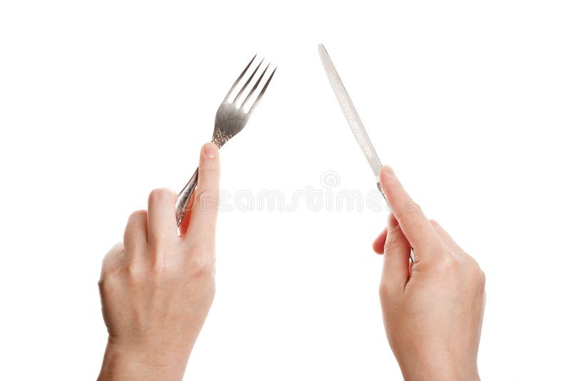 Knife and fork in hands stock photo. Image of concept - 25090022
