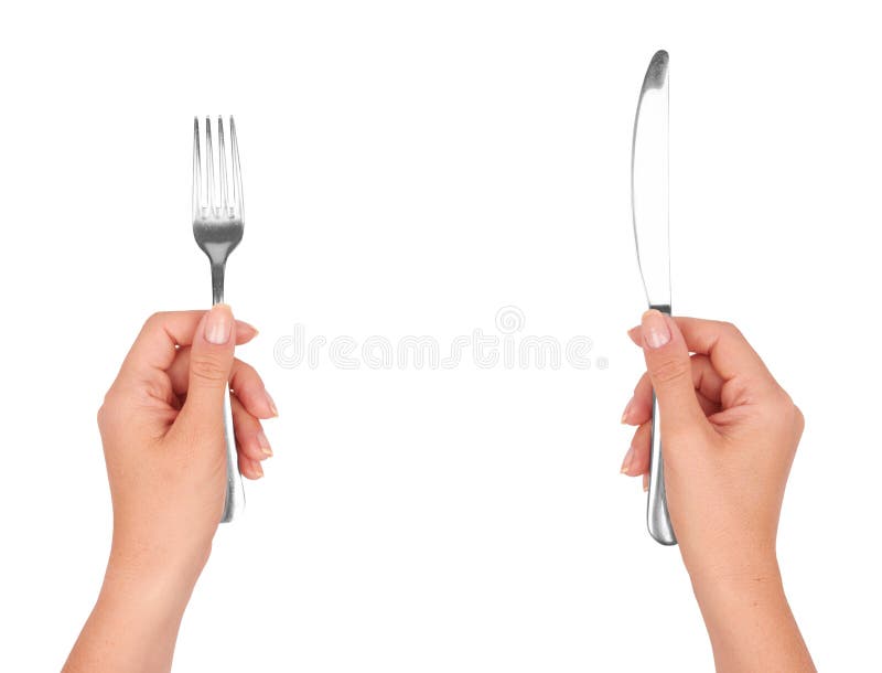 A knife and fork in hands stock photo. Image of butter - 26704418
