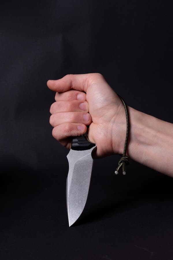 The Knife in the Hand. Assault with a Knife. the Weapon in the Hand ...