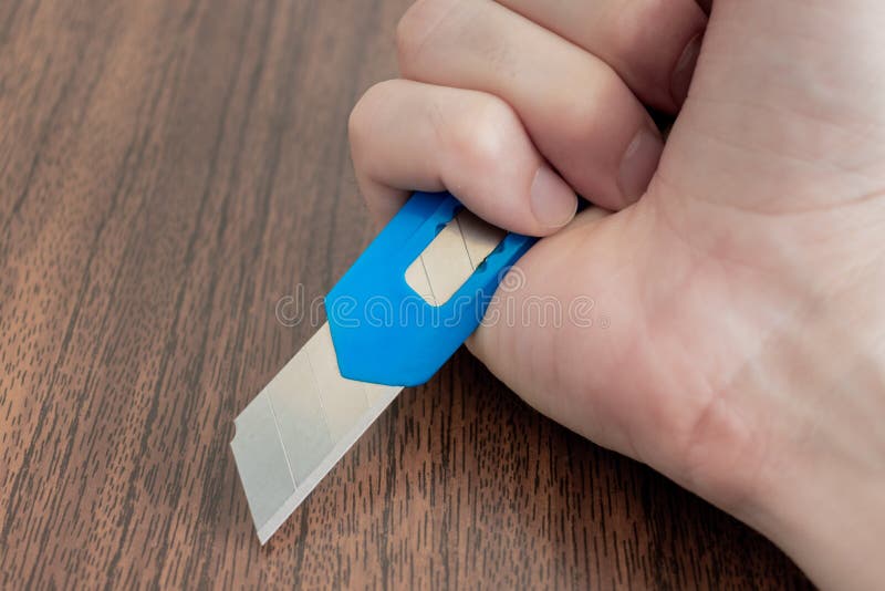 Knife in Hand on Brown Background Stock Photo - Image of criminal ...