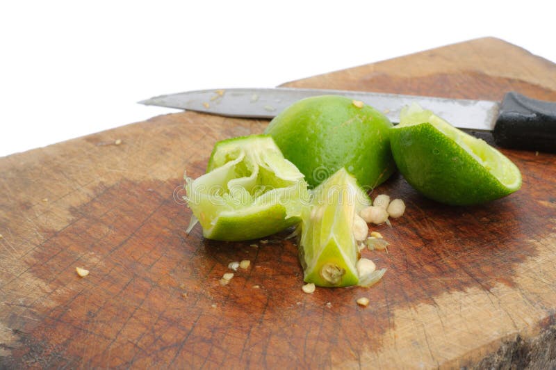 Knife and Lime on Wood Cutting Board Stock Photo - Image of kitchen ...
