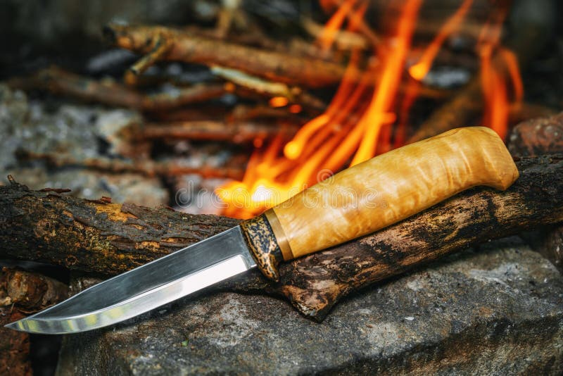 Knife next to the fire stock image. Image of park, outdoor - 360467753