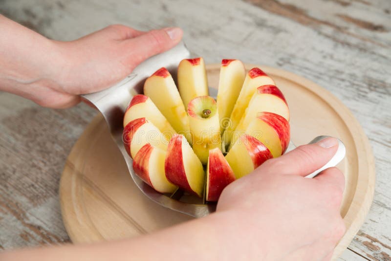 A knife in a red apple stock photo. Image of chopping - 39675718
