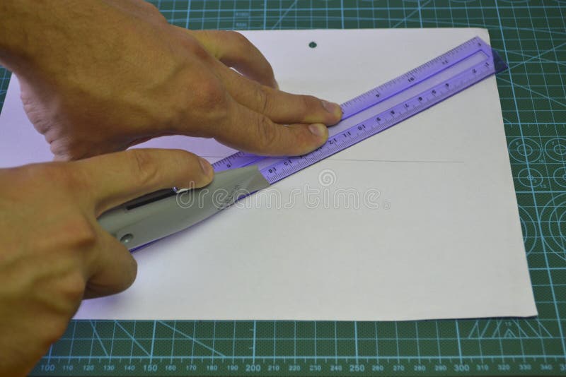 A knife and a ruler stock image. Image of business, drawing - 157415709