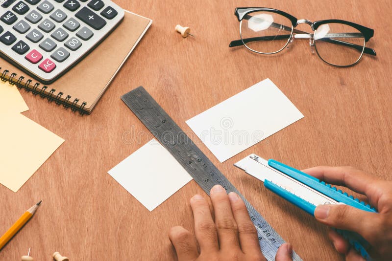 Knife with Ruler and Paper on Wood Table Stock Image - Image of plan ...