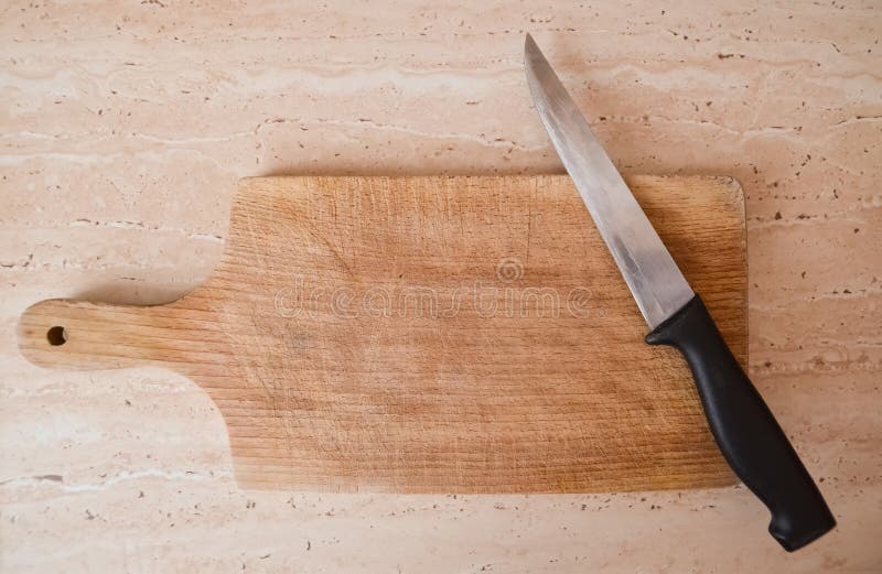 Knife on Rustic Kitchen Table Stock Photo - Image of food, closeup ...