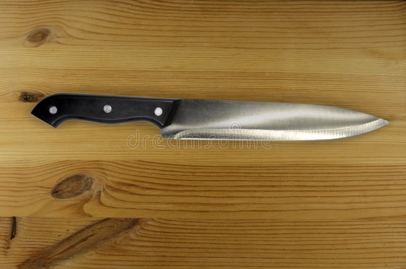 Knife on Rustic Kitchen Table Stock Photo - Image of counter, copy ...