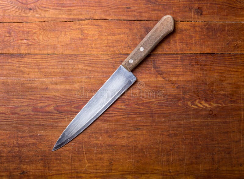 Knife on Rustic Kitchen Table with Copy Space Stock Image - Image of ...