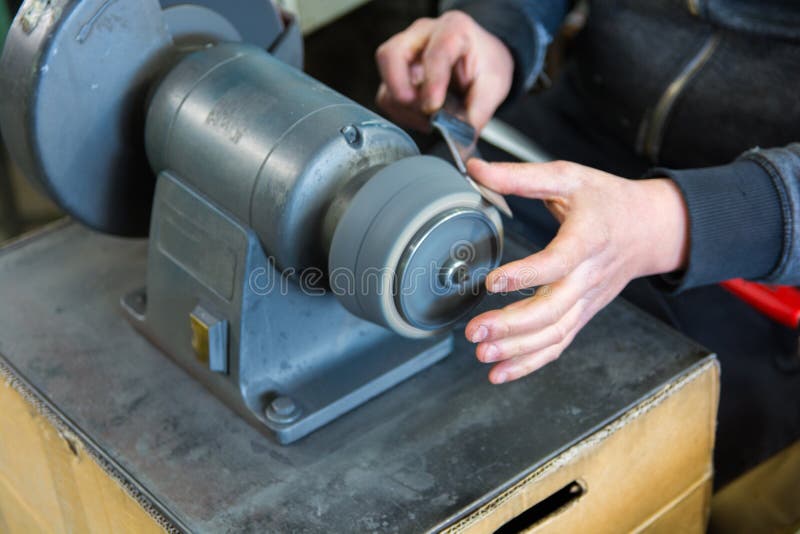 Knife sharpening machine stock photo. Image of garage - 141502878