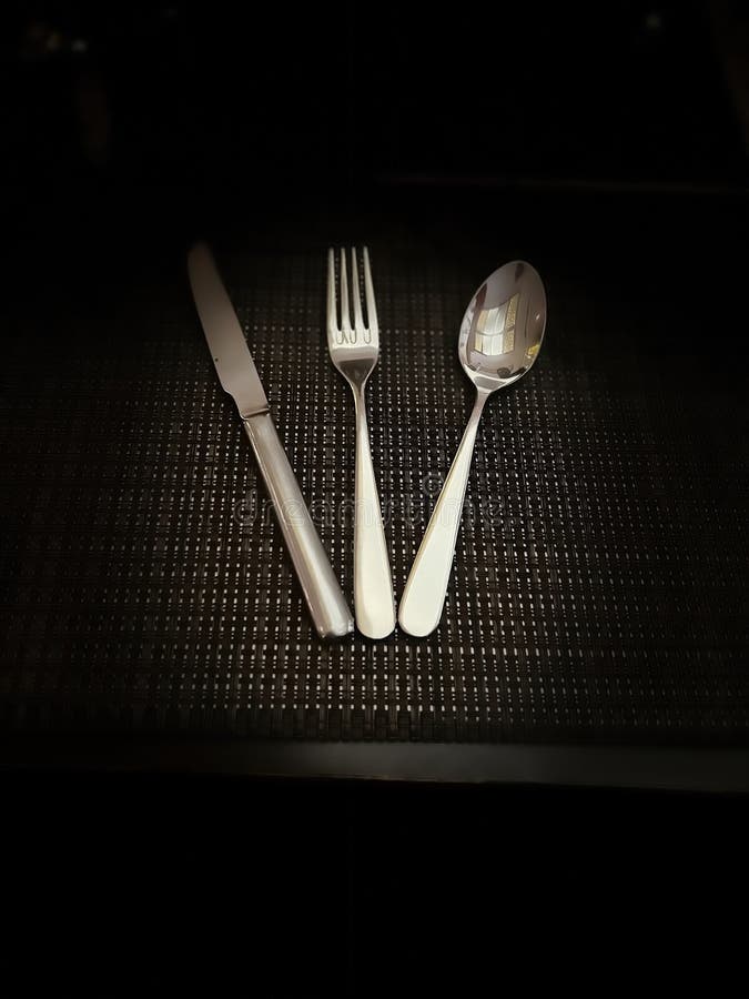 Knife, Spoon, and Fork Set on the Dining Table Stock Photo - Image of ...