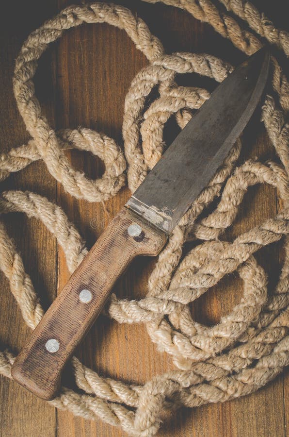 Knife with Wooden Handle and Rope on Old Wooden Background. Top View ...