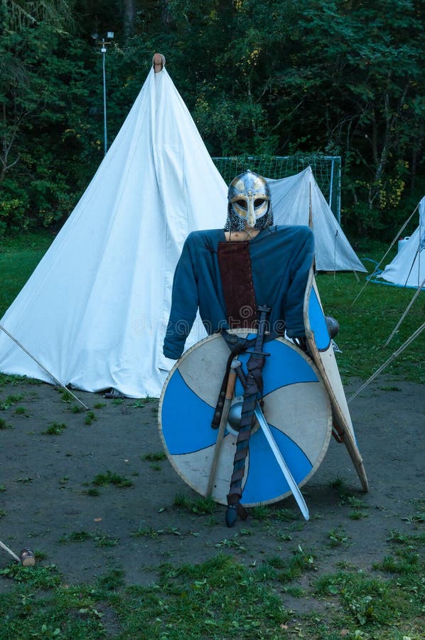 Knight Armor on Display with Shield and Weapons Stock Image - Image of ...