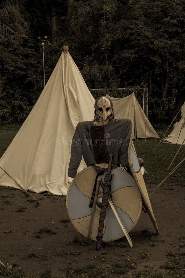 Knight Armor on Display with Shield and Weapons Stock Image - Image of ...