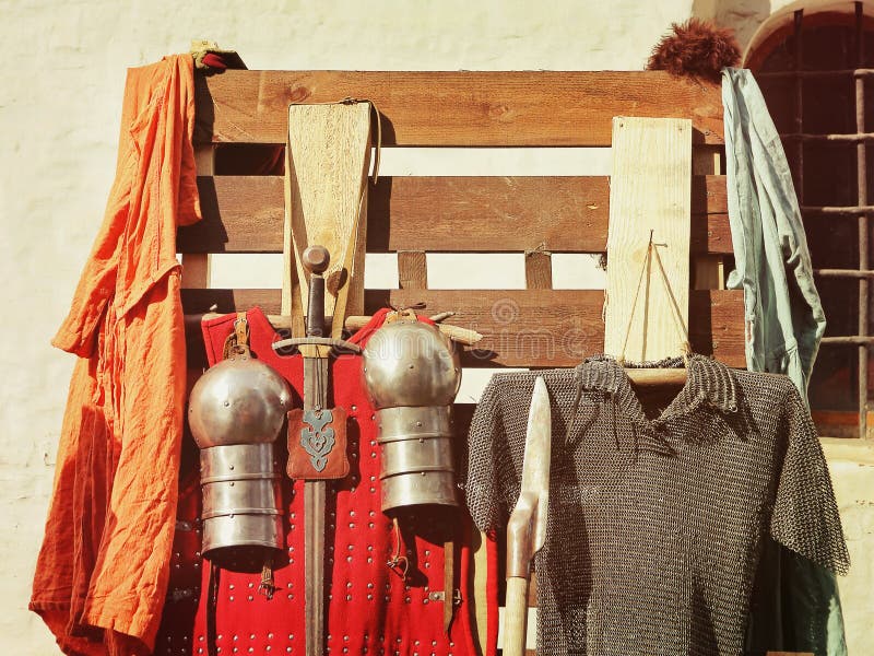 Knight Armor in Front of Old Castle Wall. Stock Image - Image of ...