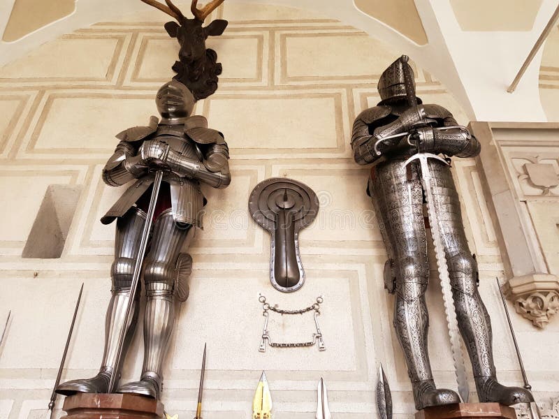 Knight armor with swords editorial stock image. Image of figurine ...