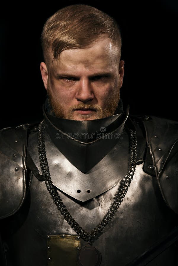 Knight in Armour after Battle on the Black Background Stock Photo ...