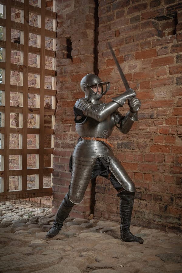 Knight in Full Armor with a Sword Stock Photo - Image of history ...