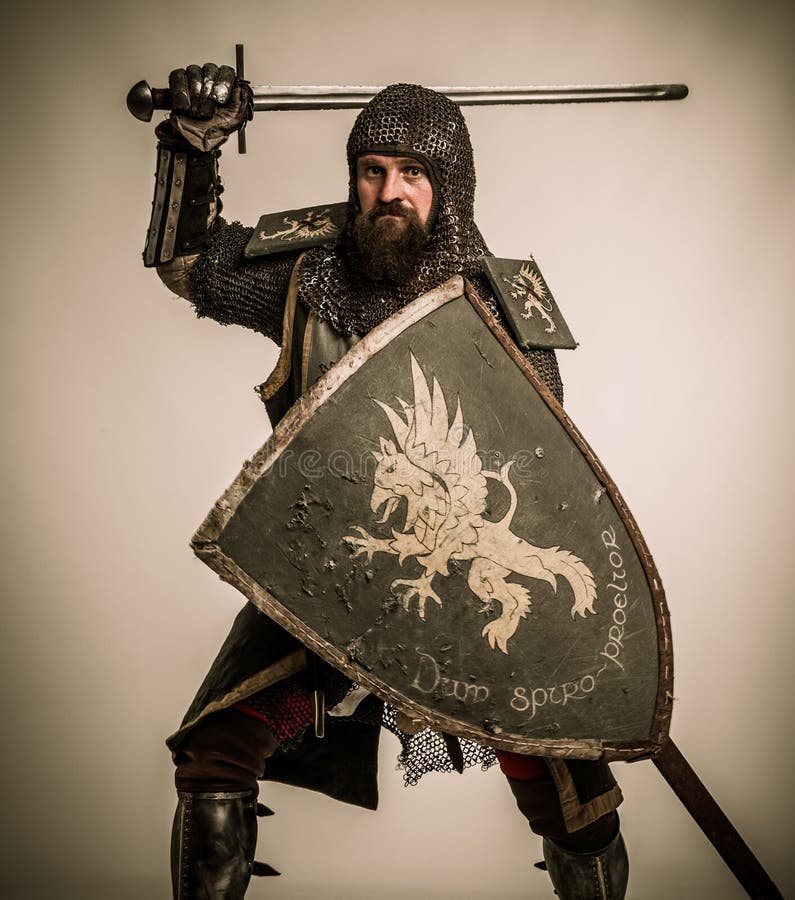 Great Knight Holding His Sword Stock Photo - Image of classic, antique ...