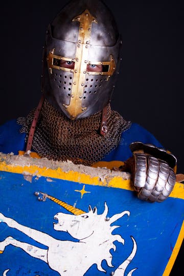 Knight Hiding Behind Shield Stock Photo - Image of helmet, courage ...