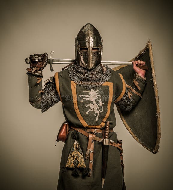 Knight Holding Sword Behind His Back Stock Photo - Image of aggression ...
