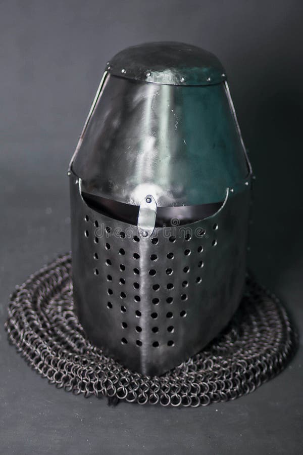 Knight in Chainmail with a Shield and a Sword in His Hands Stands ...