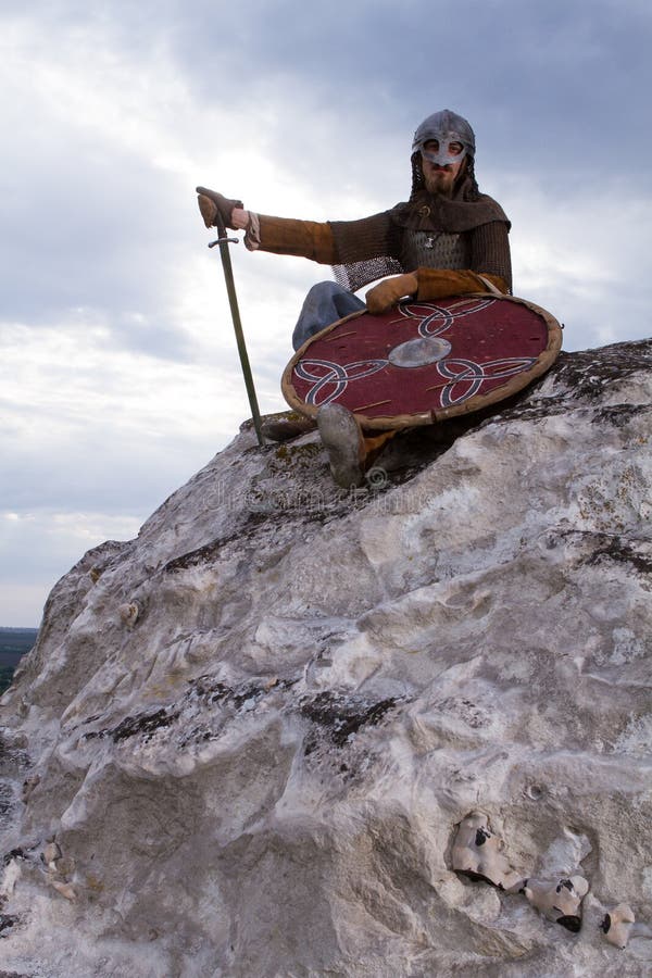 Knight sitting on a rock stock image. Image of ancient - 81820521