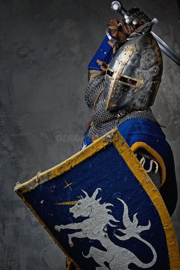 Knight with a Sword and Shield Attacking Stock Image - Image of coat ...