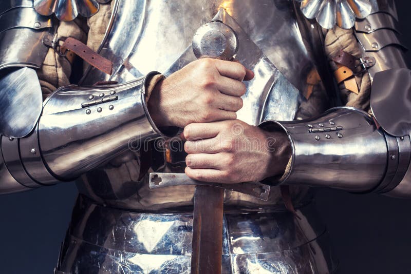 Great Knight Holding His Sword and Helmet Stock Image - Image of ...