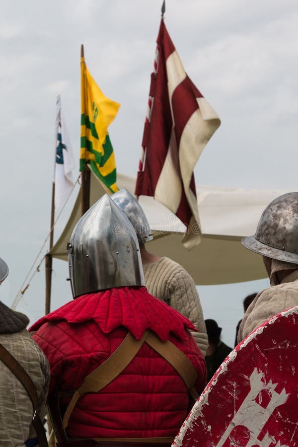 Knights with Silver Helmets and Shields Seated on Chair Stock Image ...