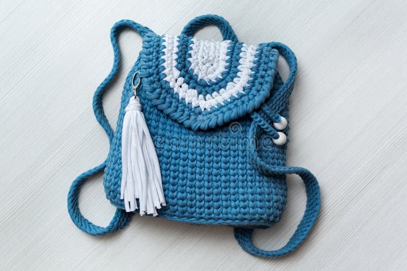 Knitted Blue Backpack on White Background. Stock Photo - Image of ...