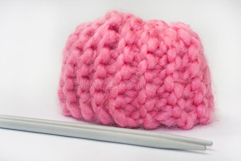 Knitted Cap Doll with Pink Wool and Needles for Knitting Stock Image ...