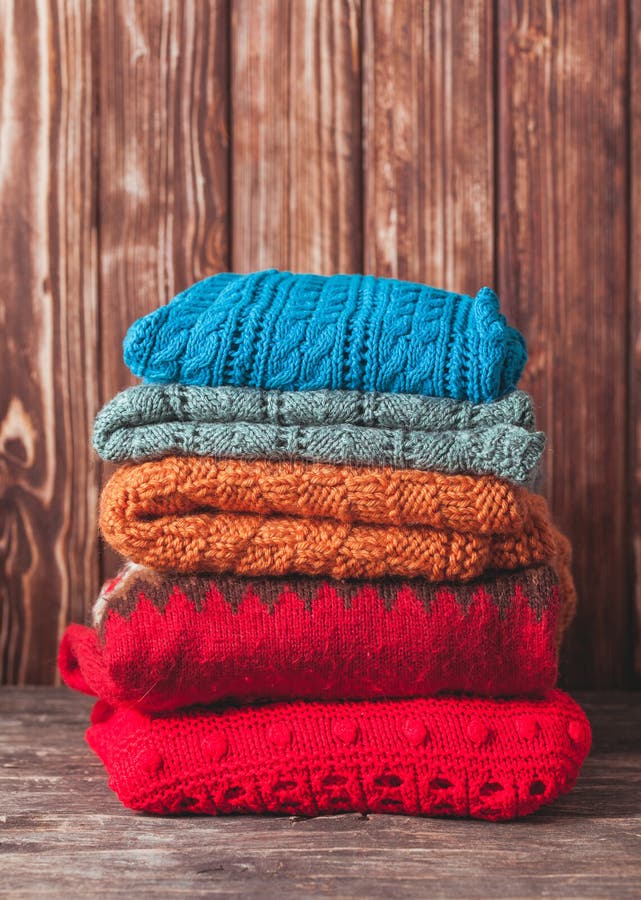Knitted clothes stack stock photo. Image of background - 81082924