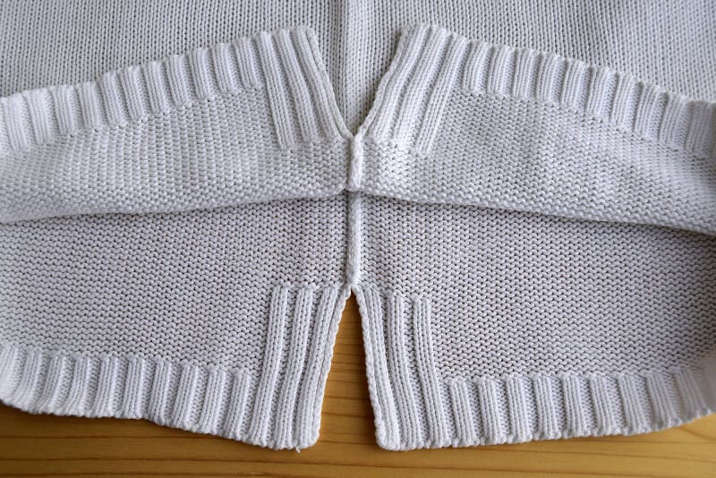 Knitted Fabric Structure from White Thread. the Edge of the Product ...