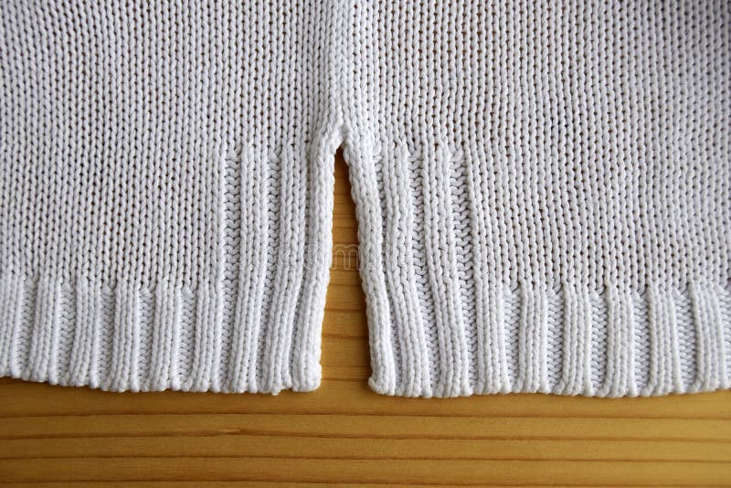 Knitted Fabric Structure from White Thread. the Edge of the Product ...