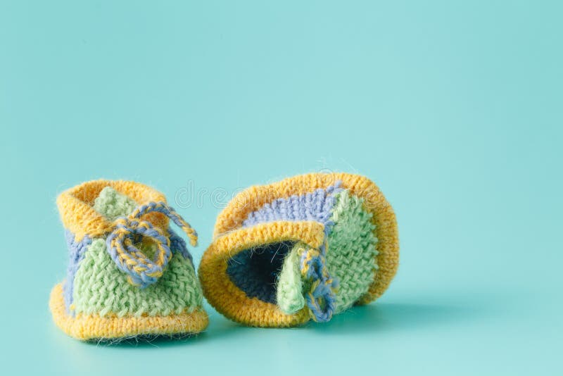 Knitted Green Baby Booties for Little Boy Stock Photo - Image of small ...