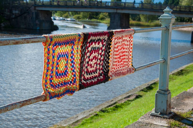 Knitted Products on Rusty Fence Stock Photo - Image of yarn, green ...