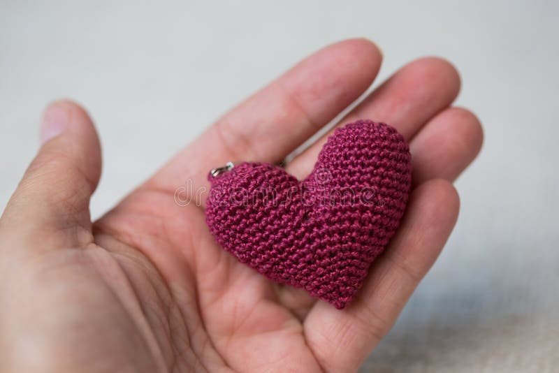 Knitted red hearts stock photo. Image of wedding, decorative - 172237400