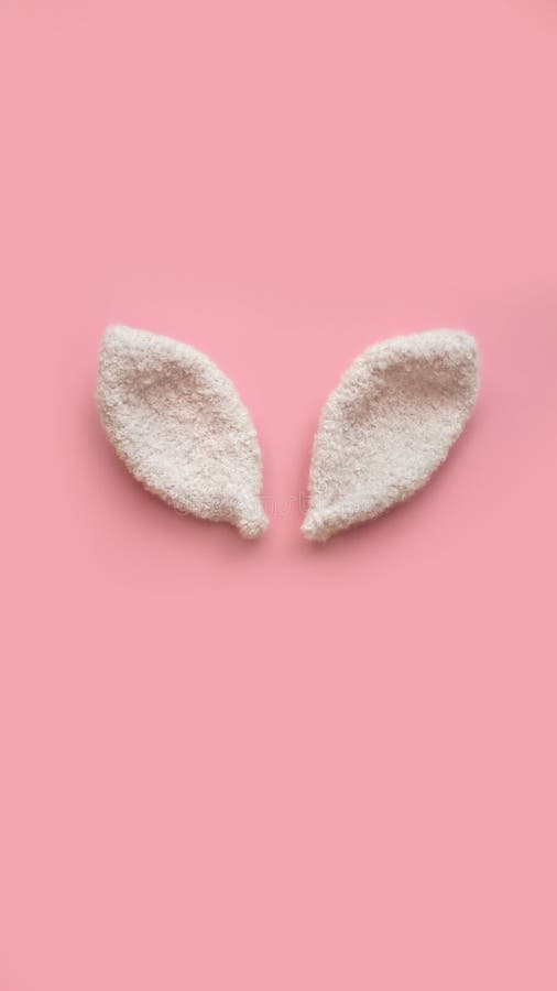 Knitted White Hare Ears on Pink Background, Vertical, 16:9 Stock Photo ...