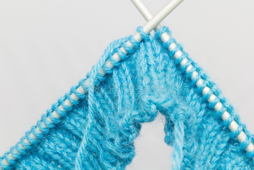 Knitting with a blue wool stock photo. Image of winter - 113522060