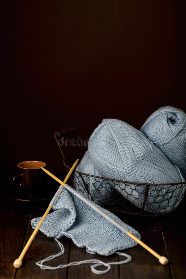 Knitting from Light Blue Yarn and a Cup of Coffee. Stock Image - Image ...